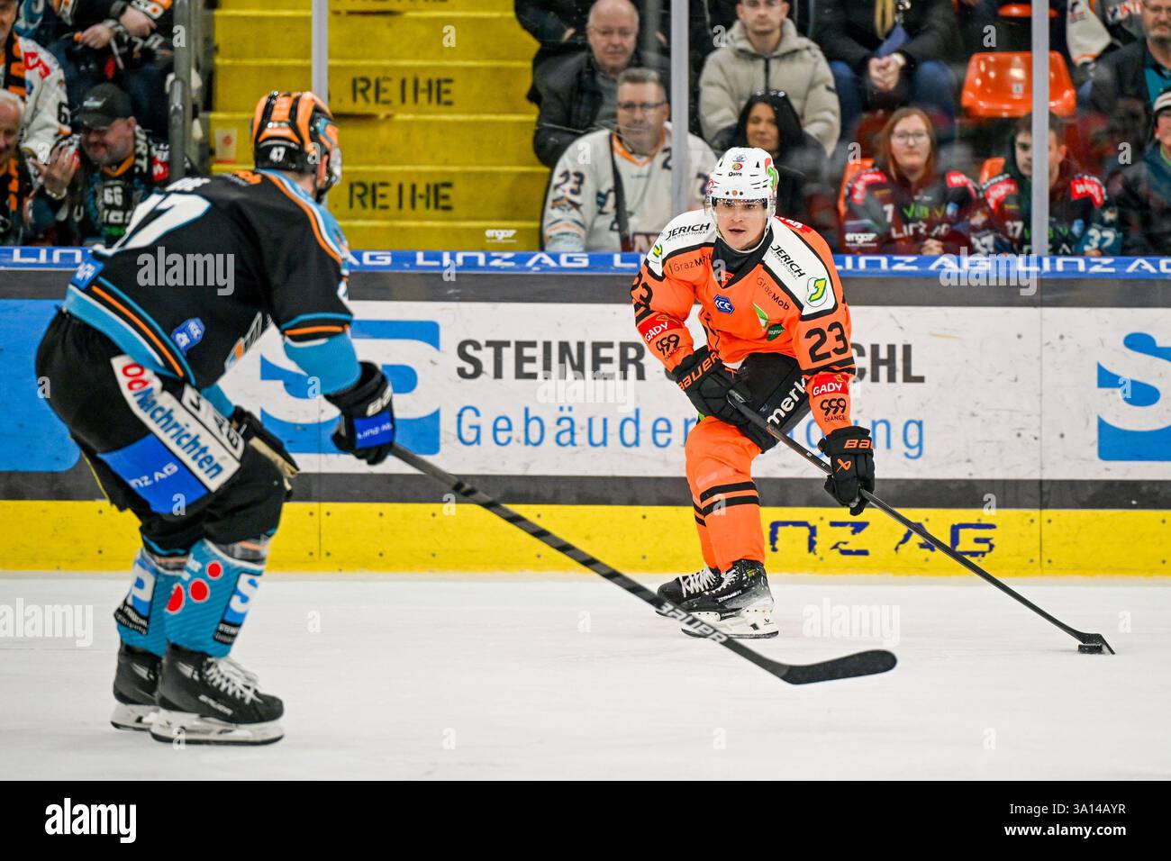 LINZ, AUSTRIA -MARCH 6: Logan Roe of Steinbach Black Wings Linz and Kevin Roy of Graz 99ers in ...