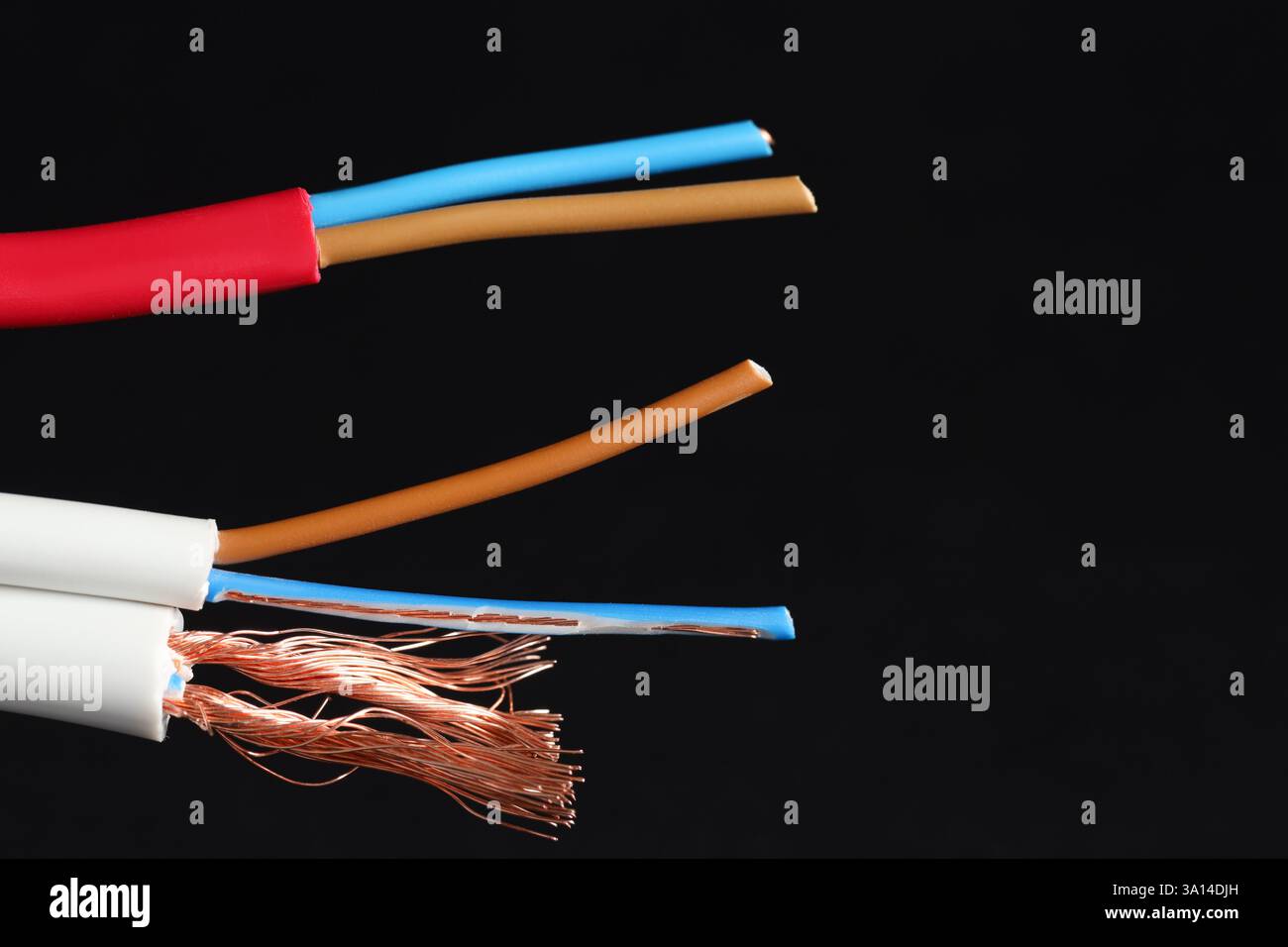 Stripped electrical wire on black background, closeup Stock Photo - Alamy