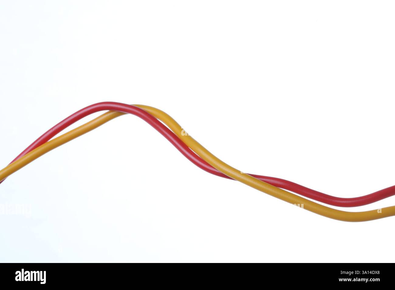 Red and yellow electrical wires on white background Stock Photo - Alamy