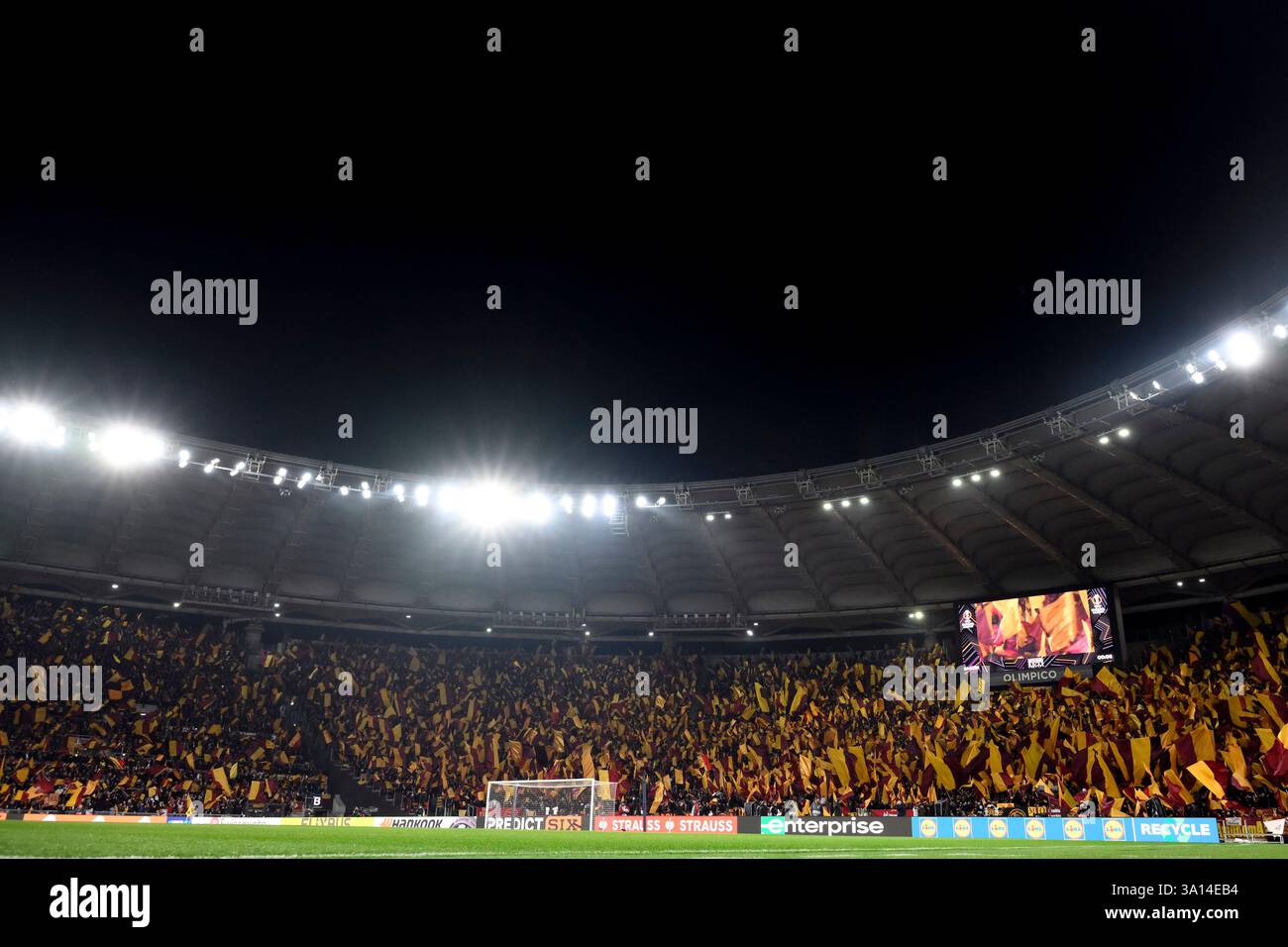 AS Roma fans cheer on during the Europa League round of 16 football ...
