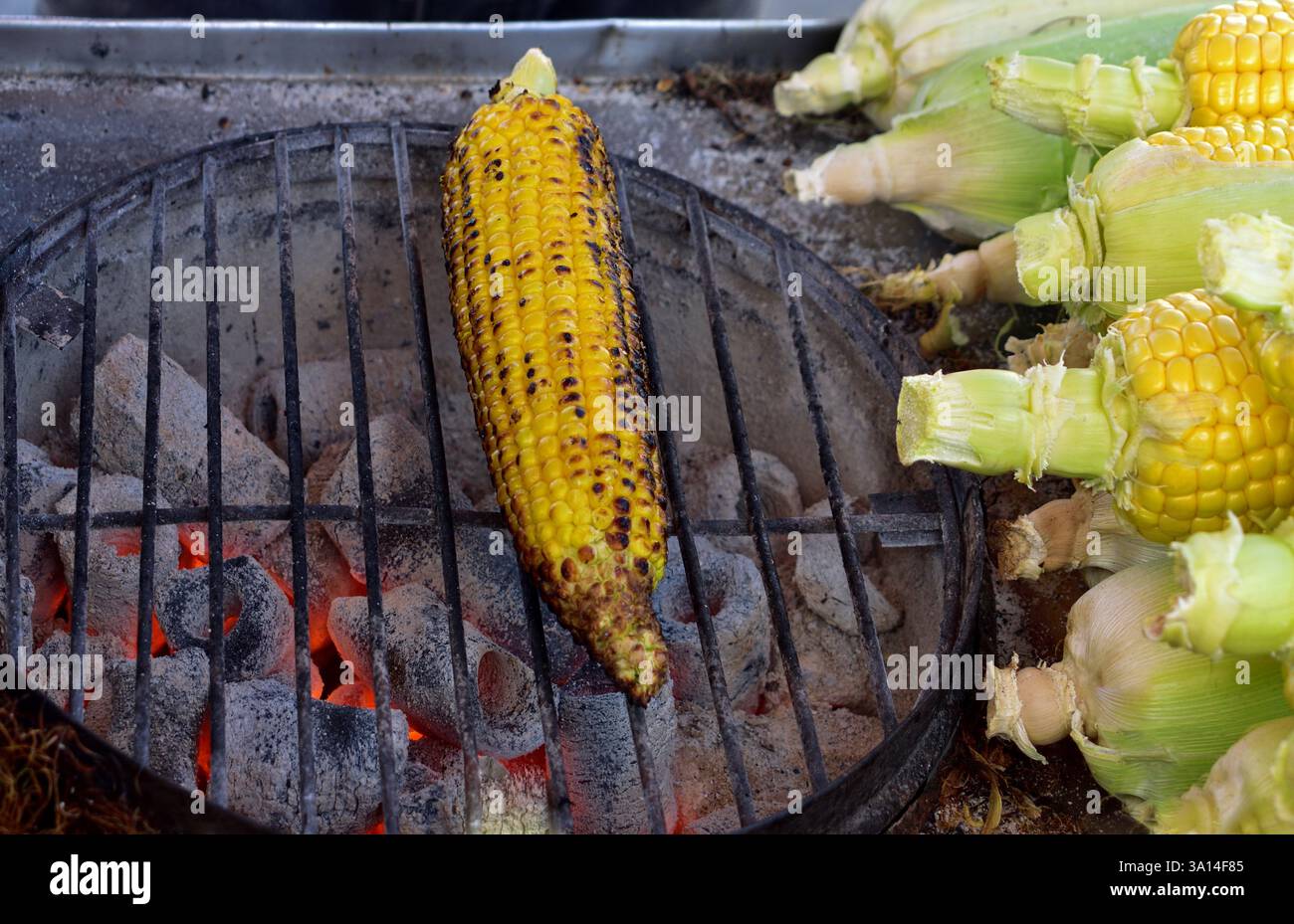Corn roast on charcoal - street food Stock Photo - Alamy