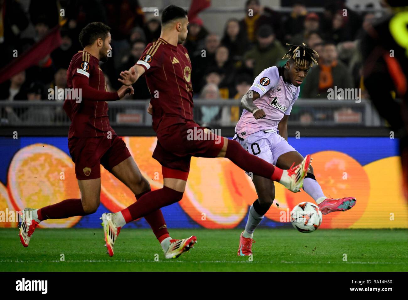Devyne Rensch, Mehmet Zeki Celik of AS Roma and Nico Williams of ...