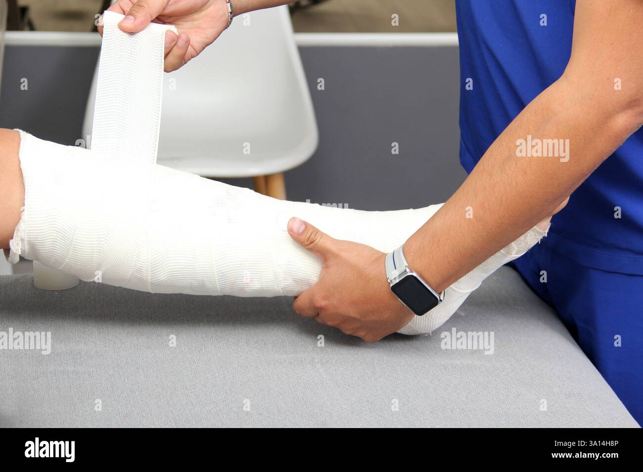 Male latin doctor specialist attends to young brunette woman patient ...