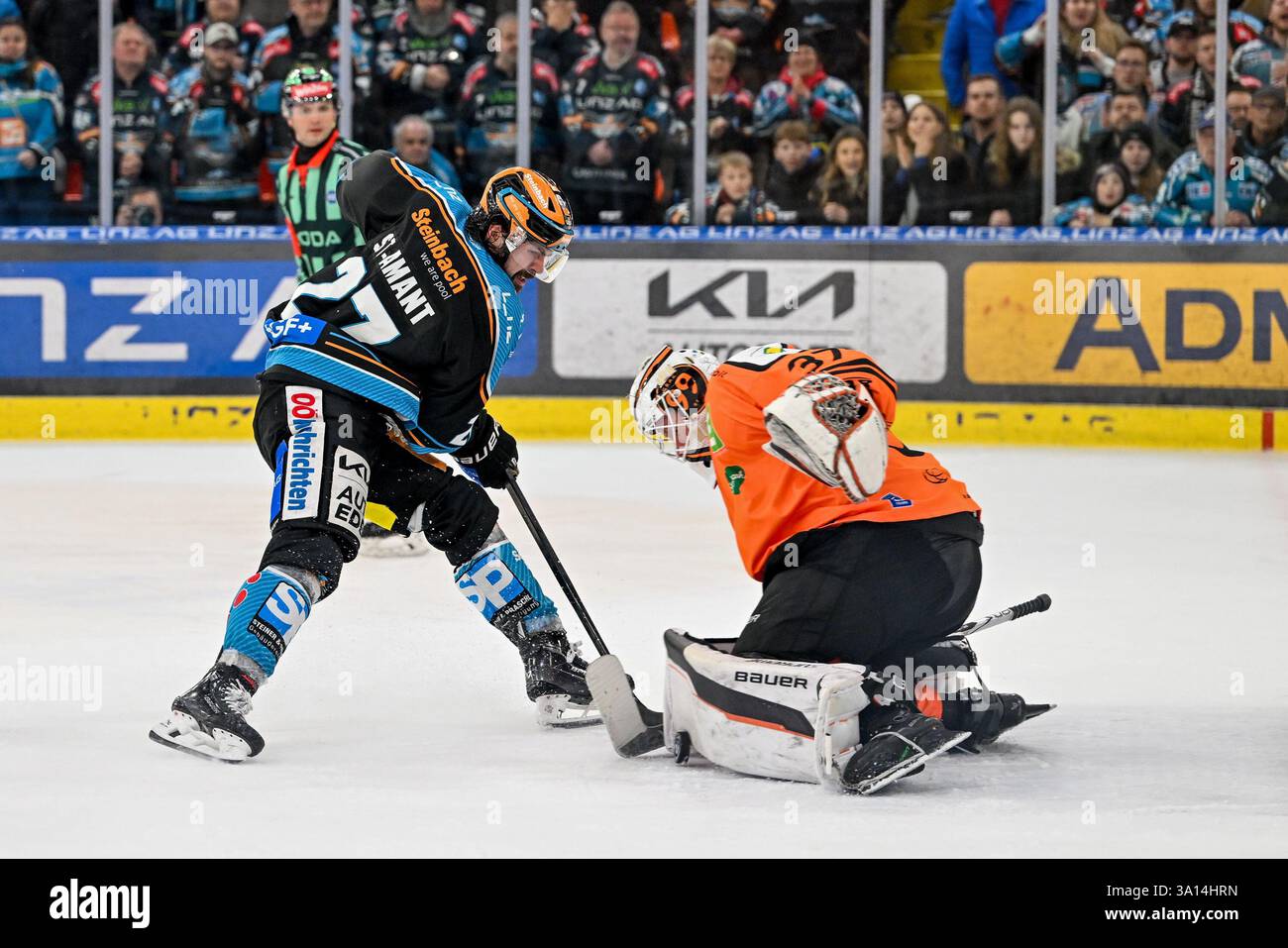 LINZ, AUSTRIA -MARCH 6: Shawn St-Amant of Steinbach Black Wings Linz and Jonas Gunnarsson of ...