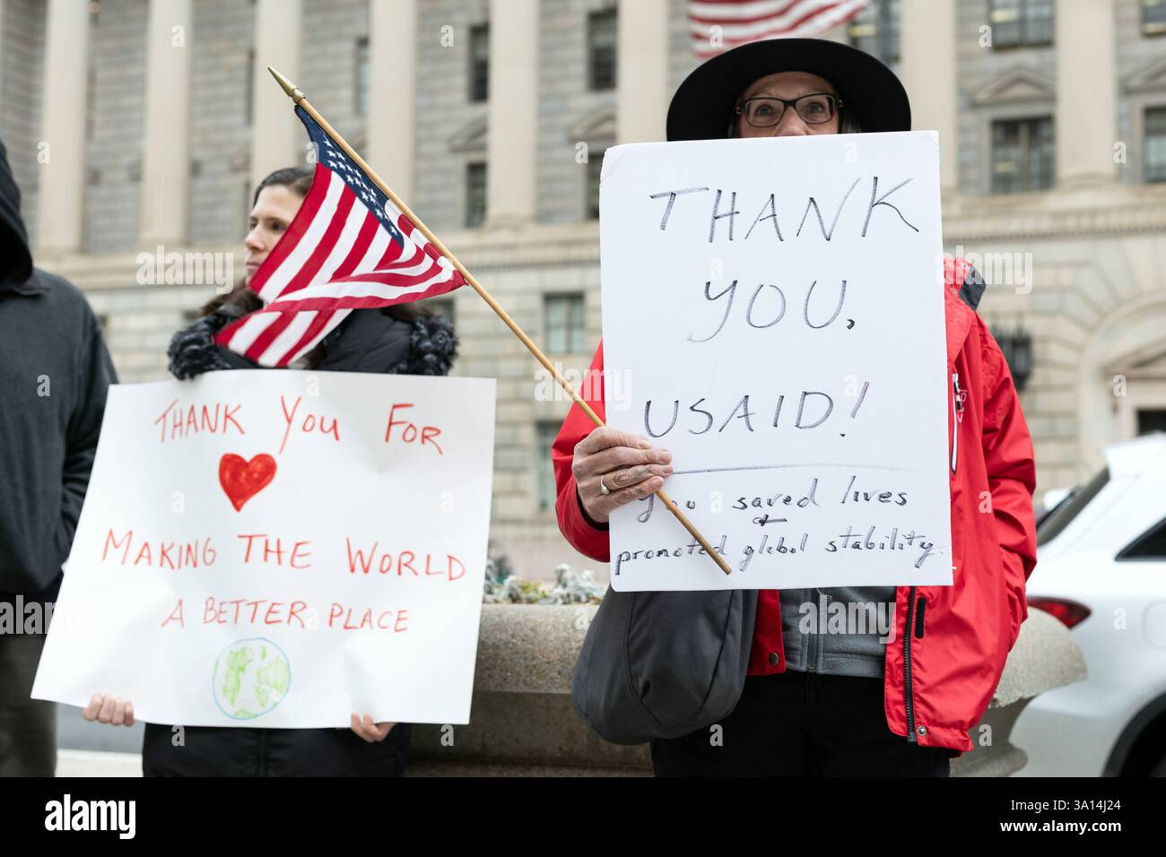 USAID employees and their supporters outside a Washington, D.C. federal ...