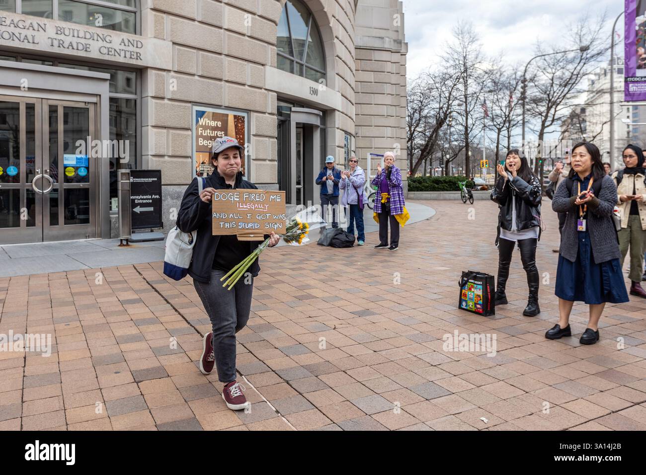 USAID employees and their supporters outside a Washington, D.C. federal ...