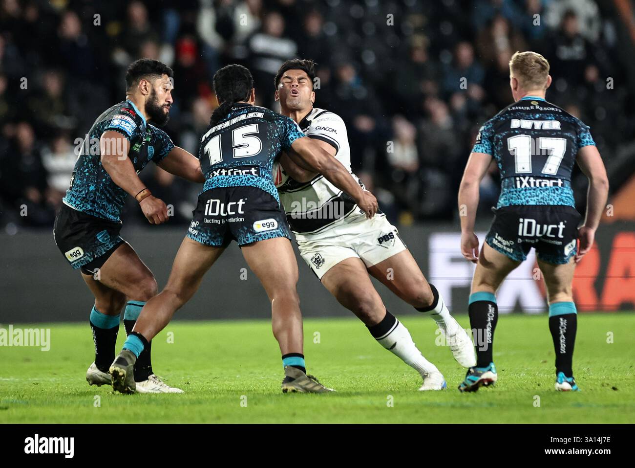 Hull, UK. 06th Mar, 2025. Herman Ese'ese of Hull FC is tackled by Alec ...