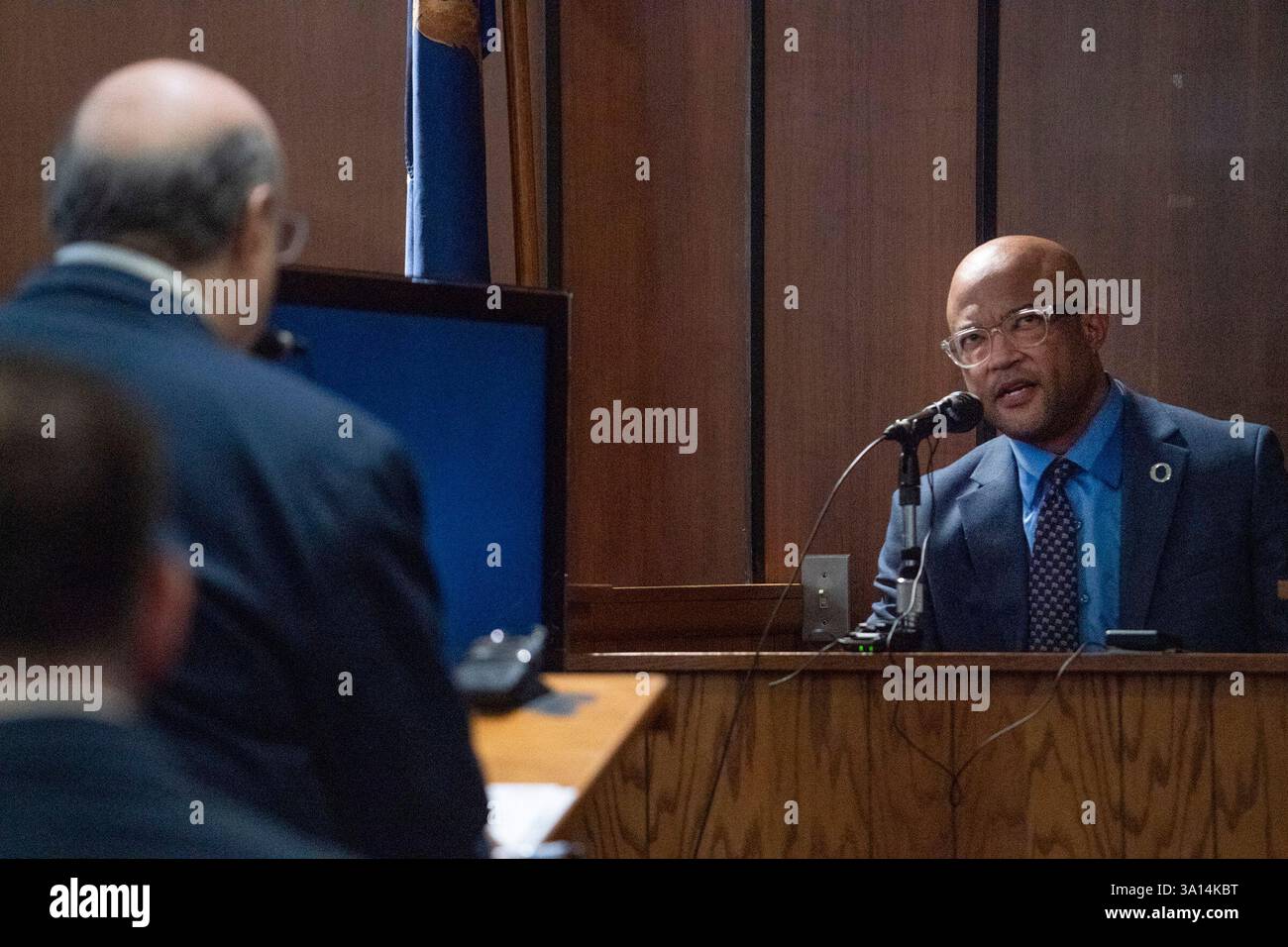 Forensic toxicologist Okorie Okorocha takes the stand, right, on behalf ...