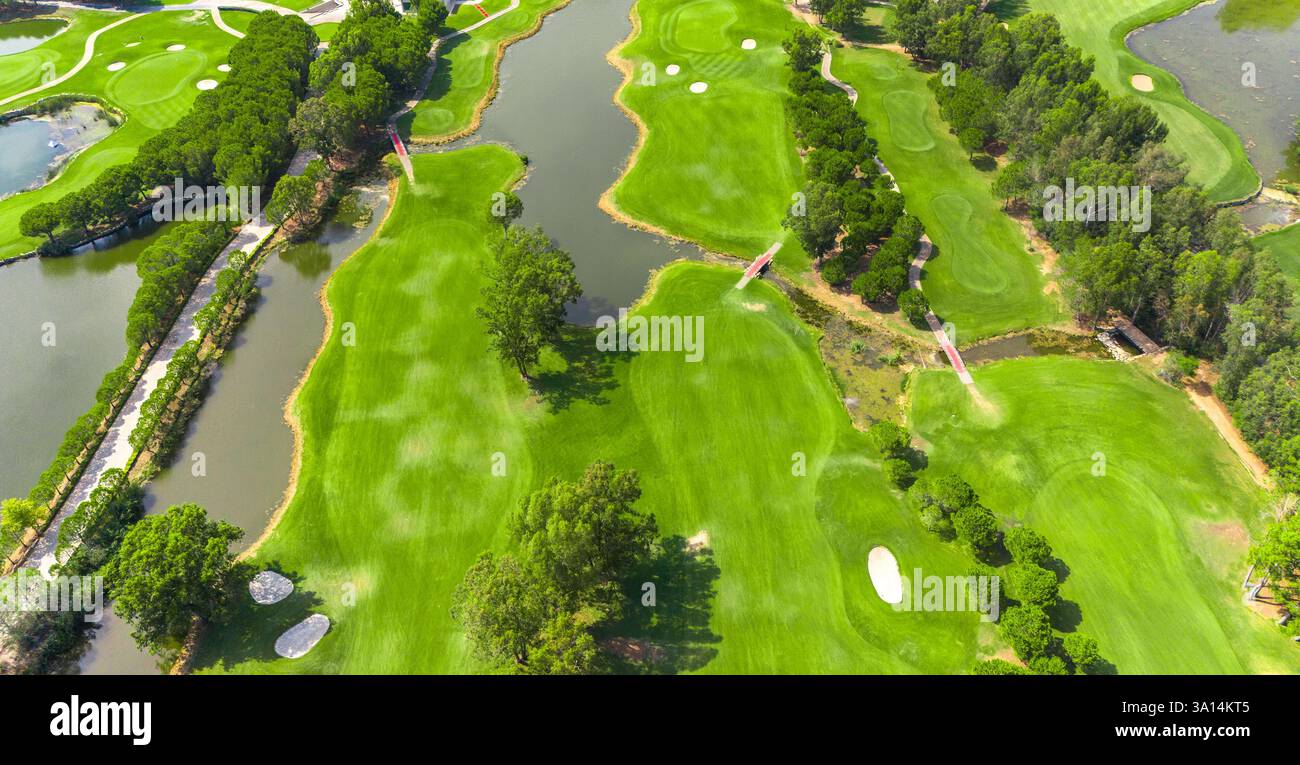 Aerial view of a golf course with water hazards, fairways, and sand ...