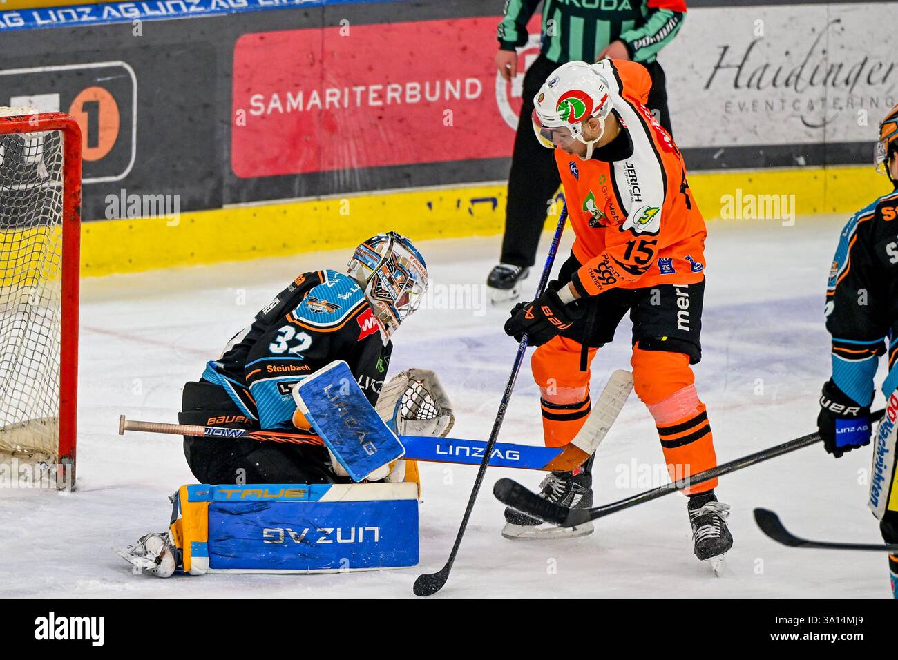 LINZ, AUSTRIA -MARCH 6: Rasmus Tirronen of Steinbach Black Wings Linz and Stephen Harper of Graz ...