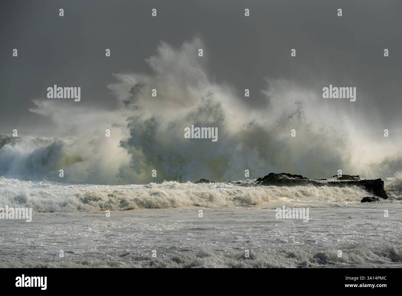 Waves break over rocks on the Gold Coast as cyclone Alfred approaches ...
