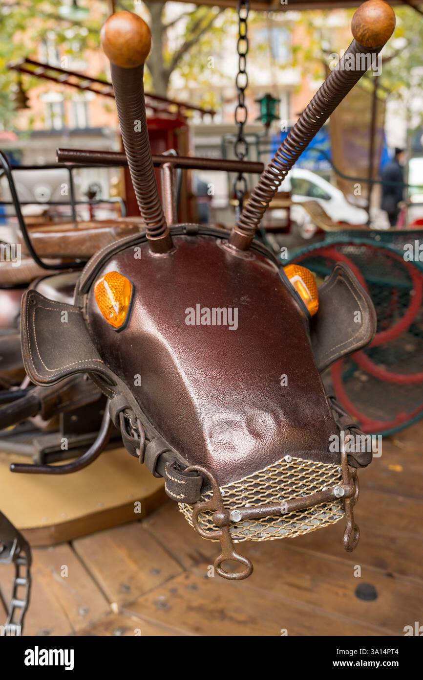 Inventive metal sculpture resembling a whimsical insect created from ...