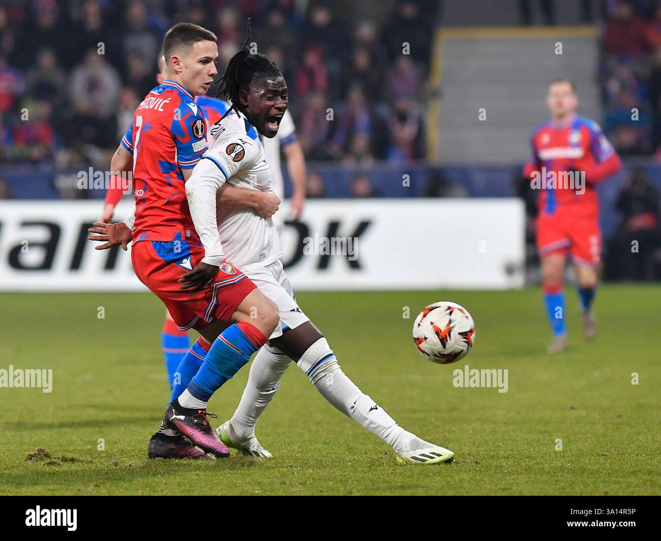 L-R Svetozar Markovic (Plzen) and Loum Tchaouna (Lazio) in action ...