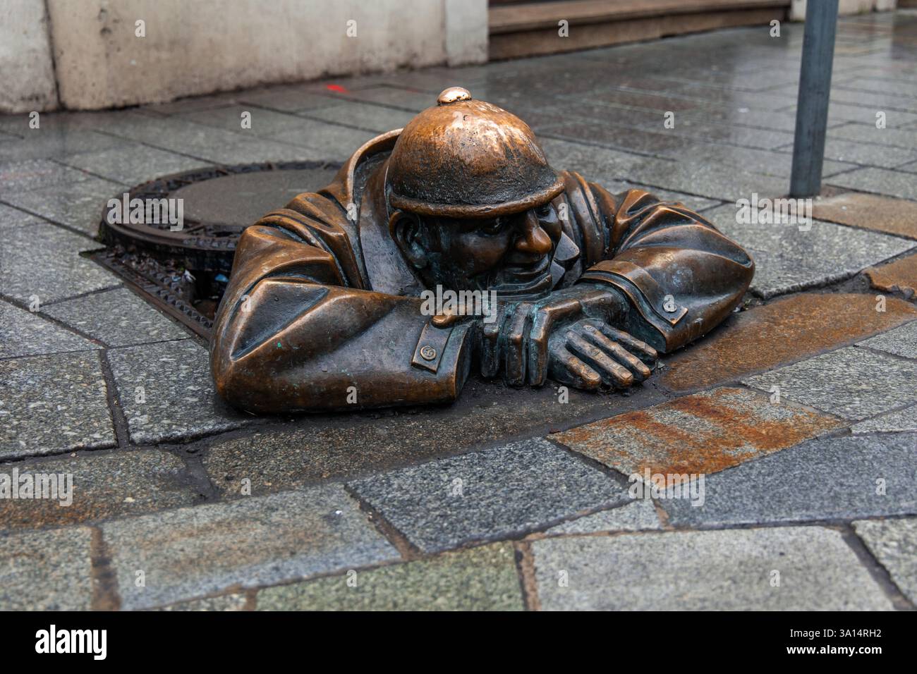 02-20-2025, Bratislava. Cumil, the iconic bronze statue of a man at ...