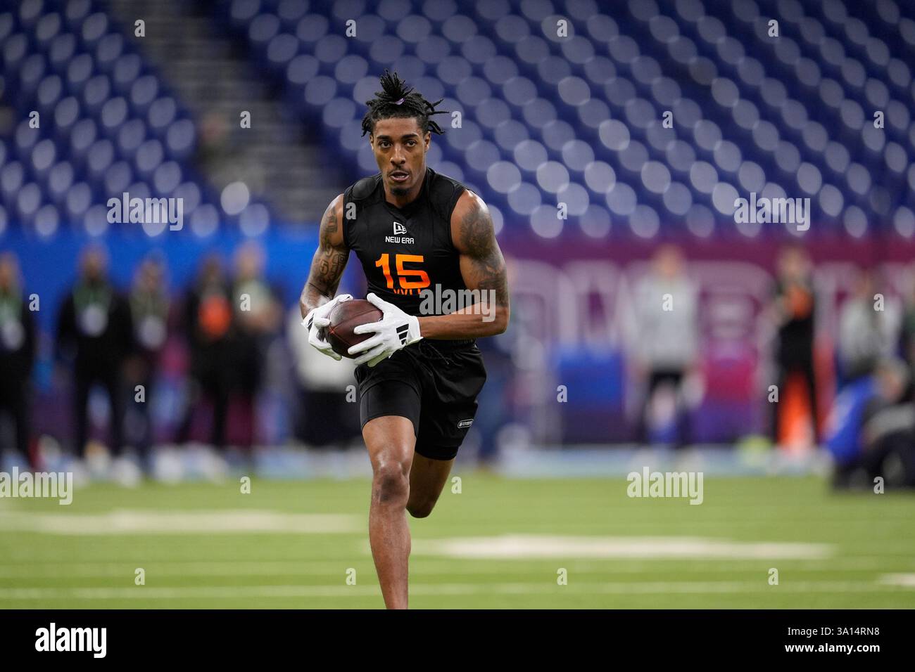 Miami wide receiver Jacolby George runs a drill at the NFL football ...