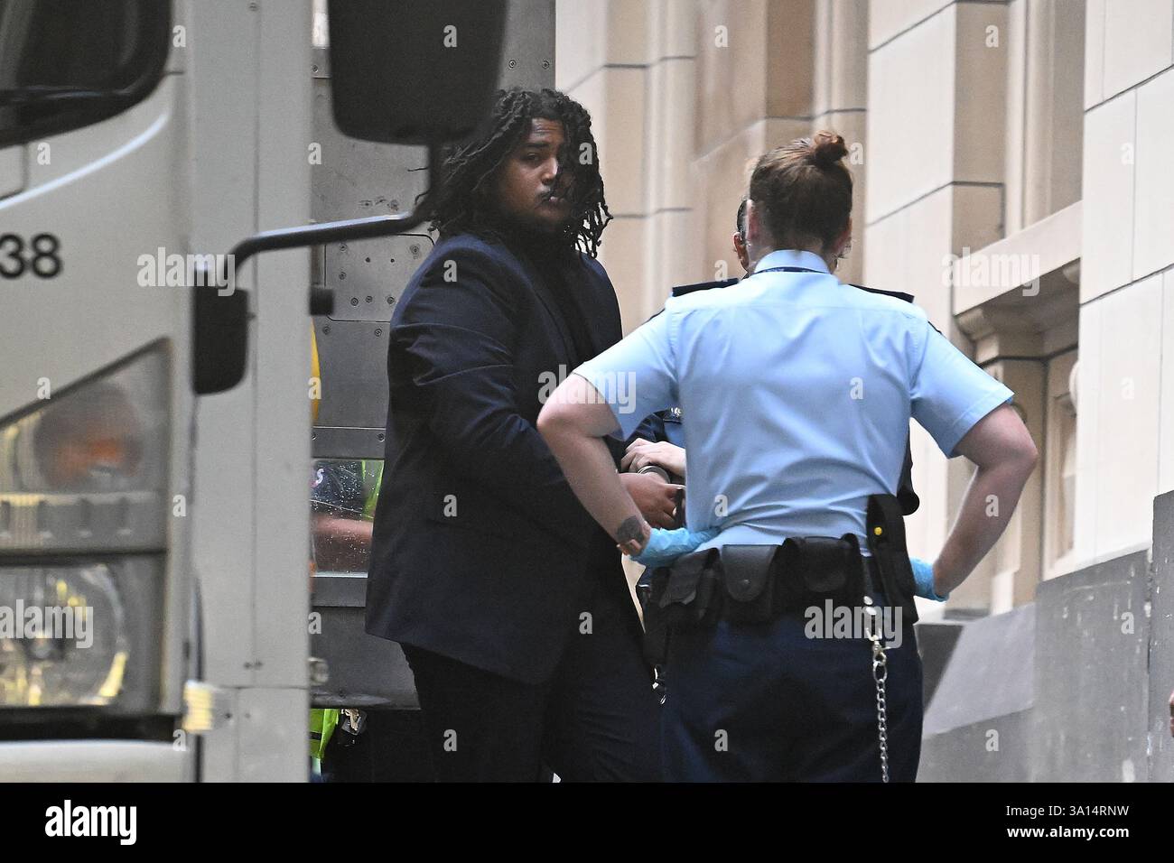 Teamrat Kassa (left) arrives to the Supreme Court of Victoria in ...