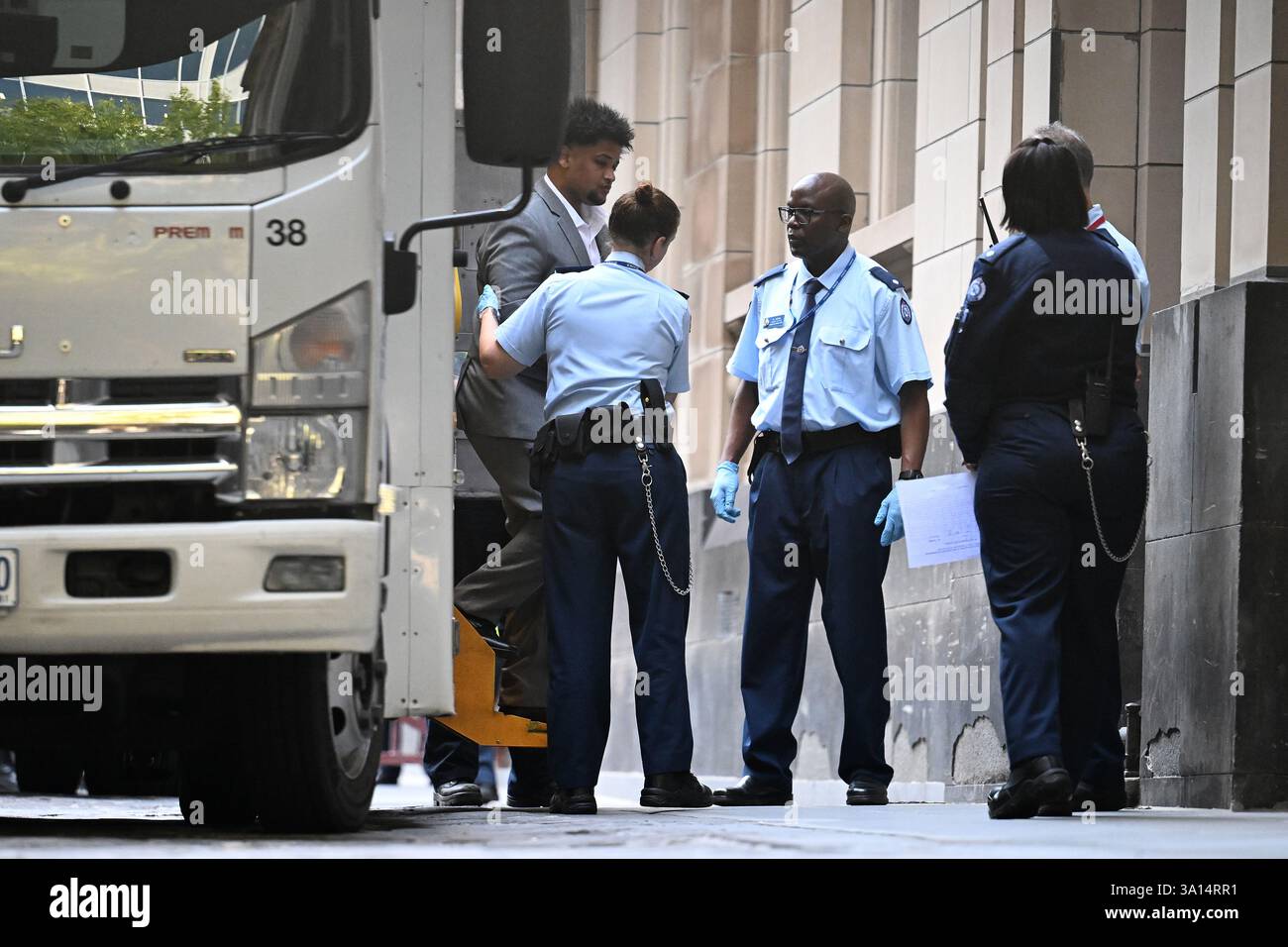Aron Gebregiorgis (left) arrives to the Supreme Court of Victoria in ...