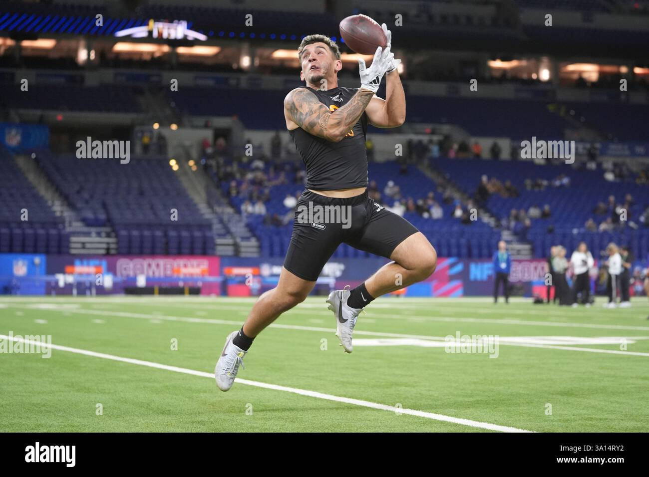 Miami wide receiver Xavier Restrepo runs a drill at the NFL football ...