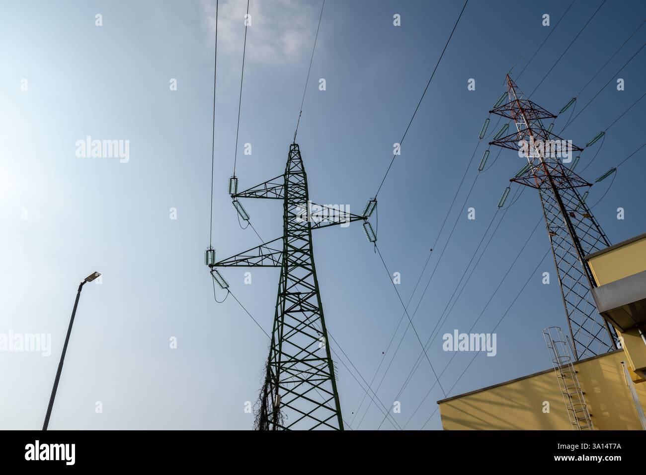 high voltage electricity pylon, a symbol of energy and infrastructure ...