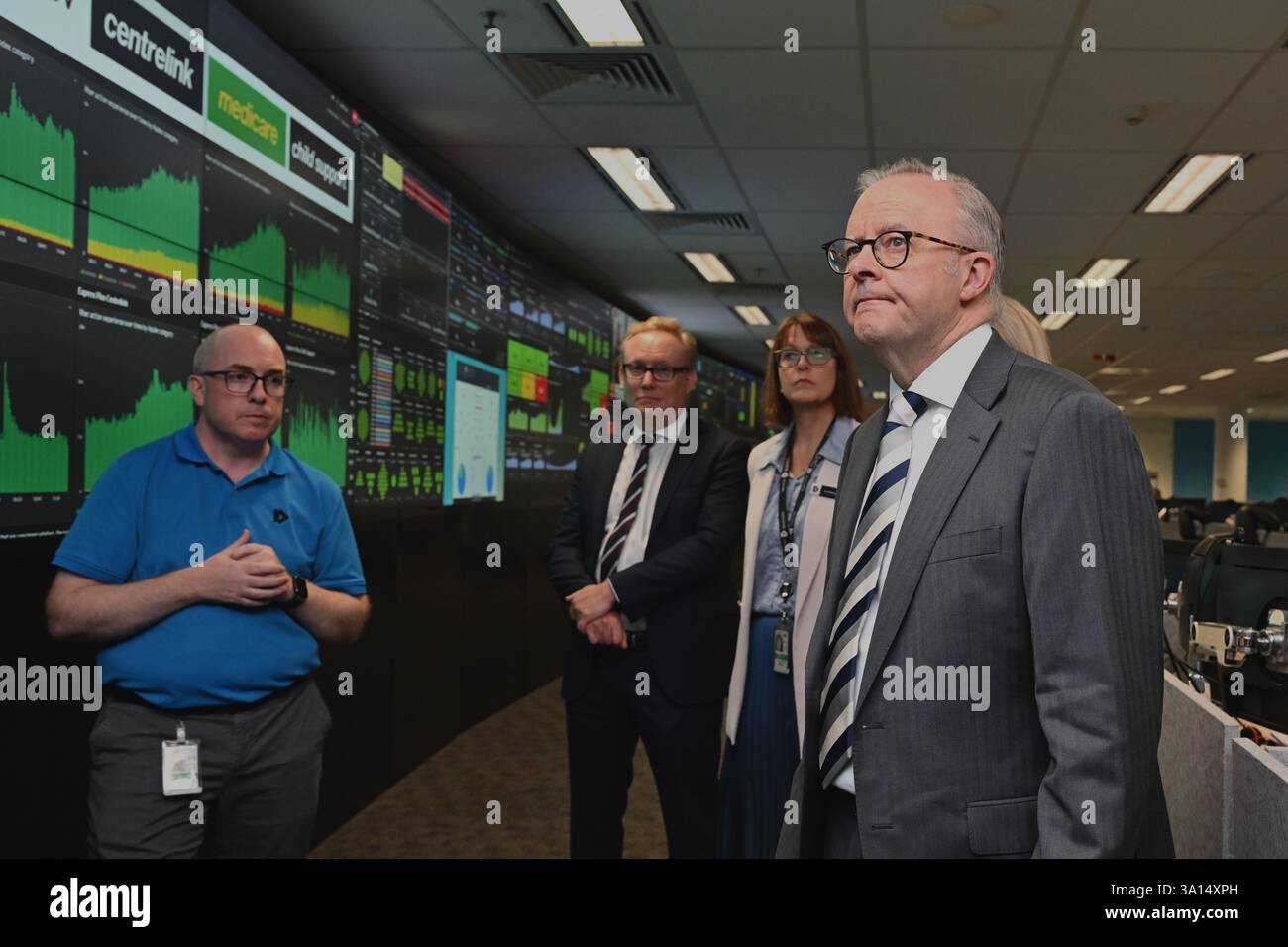 Australian Prime Minister Anthony Albanese speaks to staff during a ...