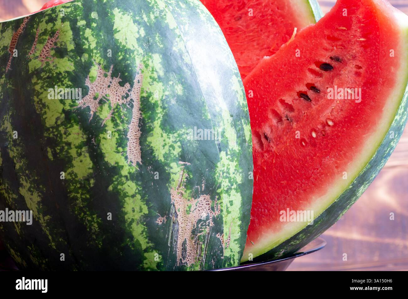 Cut red sweet watermelon from the vegetable garden Stock Photo - Alamy