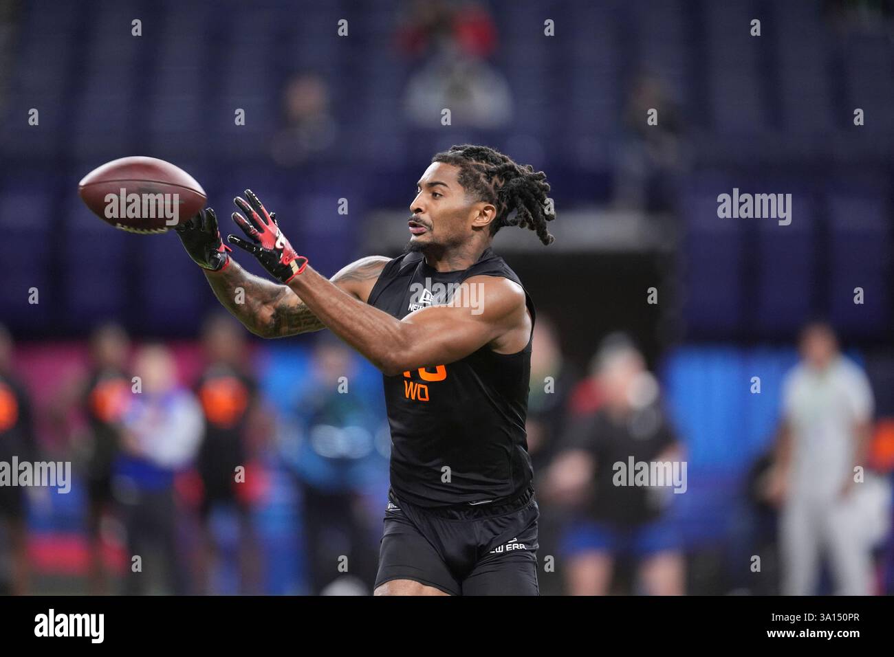 Oregon quarterback Dillon Gabriel runs a drill at the NFL football ...