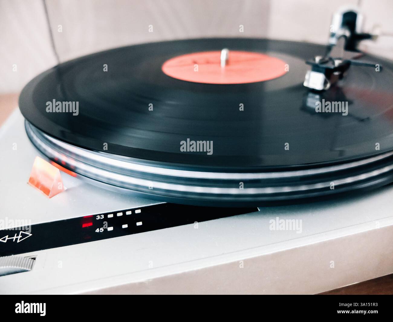 Close-up of a cartridge head on a vinyl record, analog retro music ...