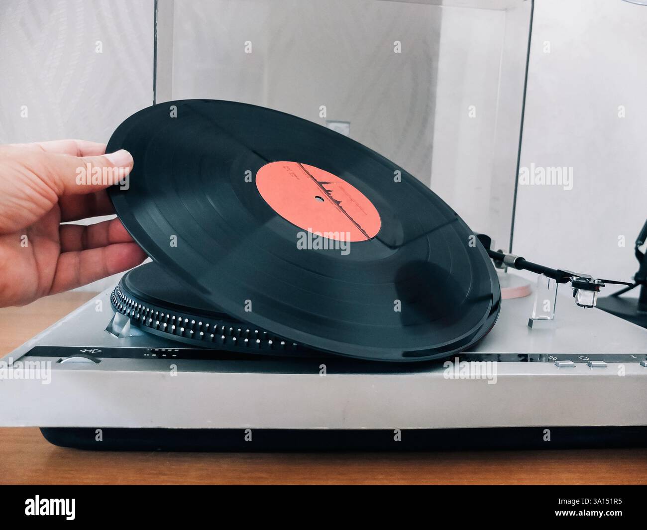 Close-up of a cartridge head on a vinyl record, analog retro music ...