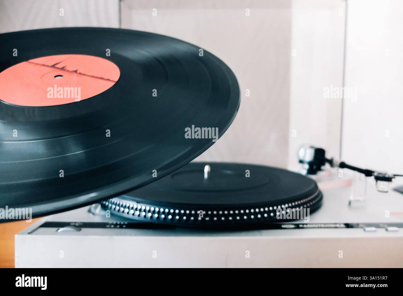 Close-up of a cartridge head on a vinyl record, analog retro music ...