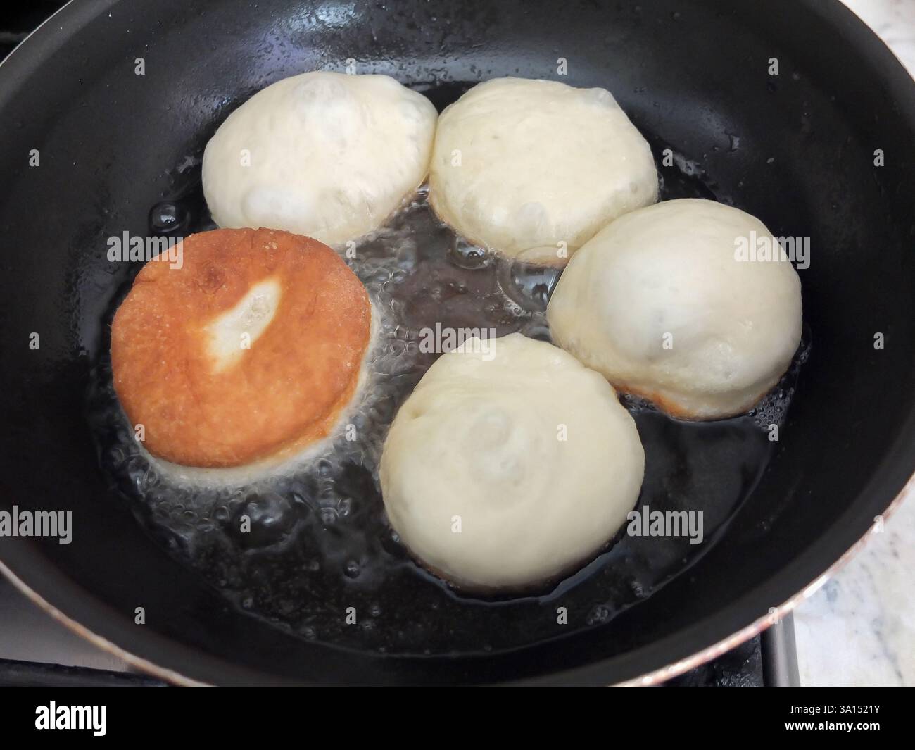 Traditional German or Austrian fried donuts with no hole, so called ...