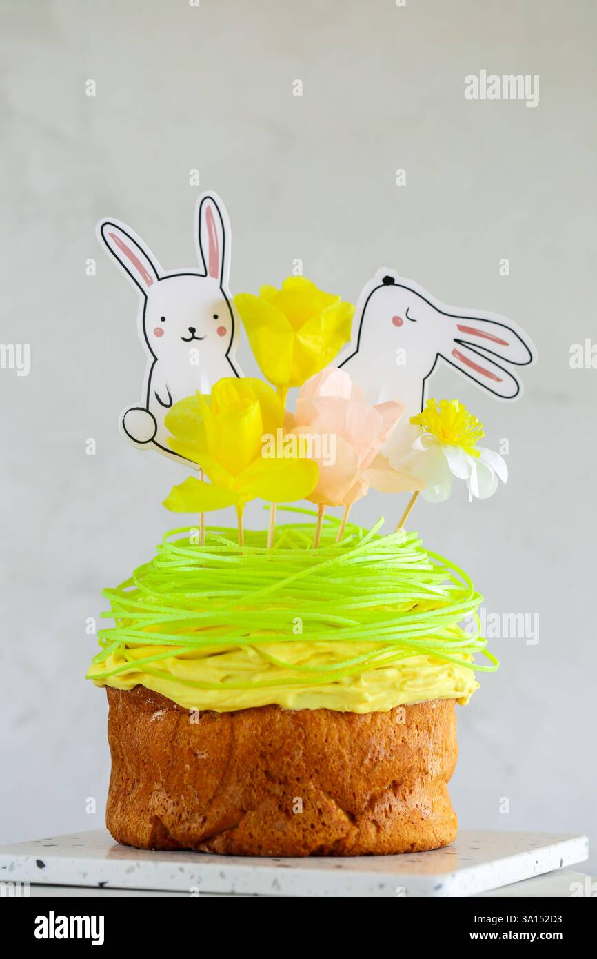 Easter Bunny cake. paper bunnies and flowers for Easter cake on a ...