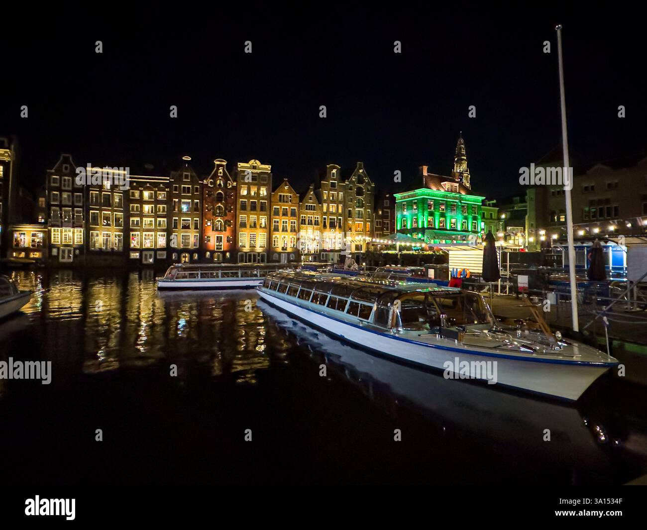 Aerial view of Amsterdam, Netherlands showcases its iconic canal houses ...
