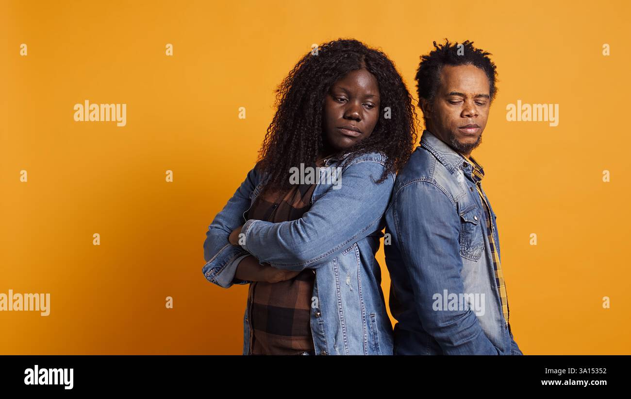 Upset husband and wife dealing with marriage quarrel and conflict ...