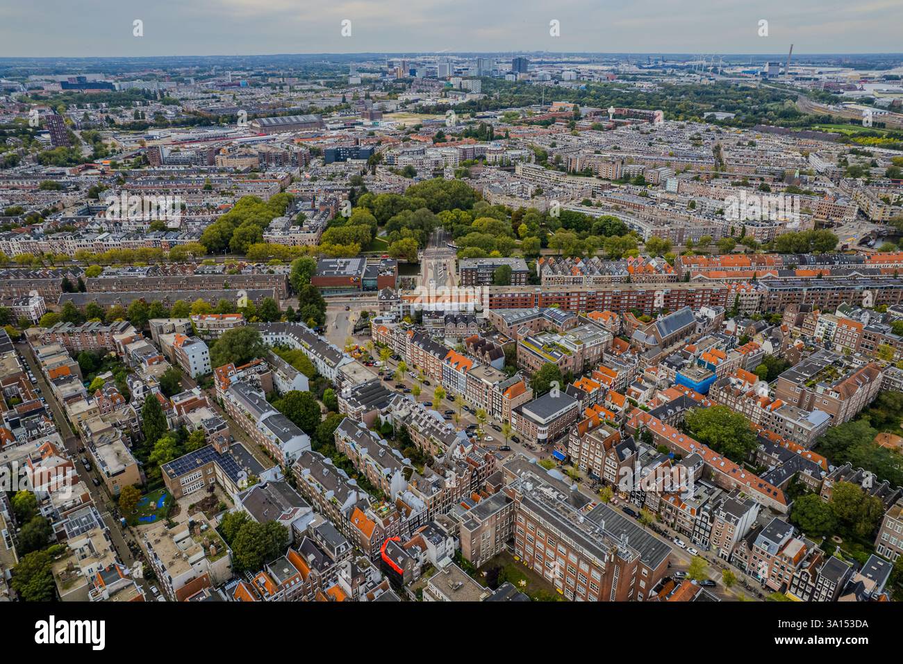 Aerial view of Amsterdam, Netherlands showcases its iconic canal houses ...