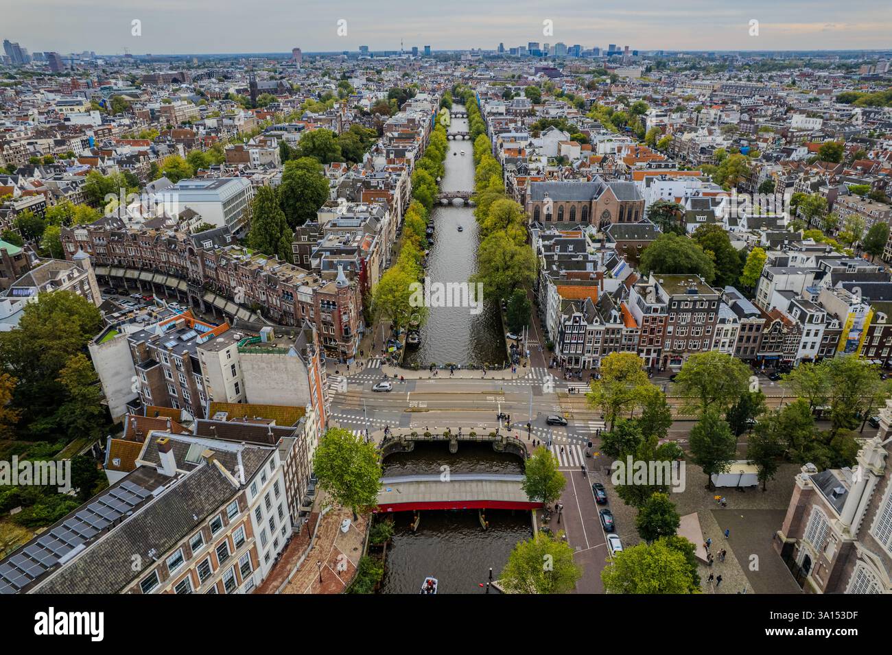 Aerial view of Amsterdam, Netherlands showcases its iconic canal houses ...