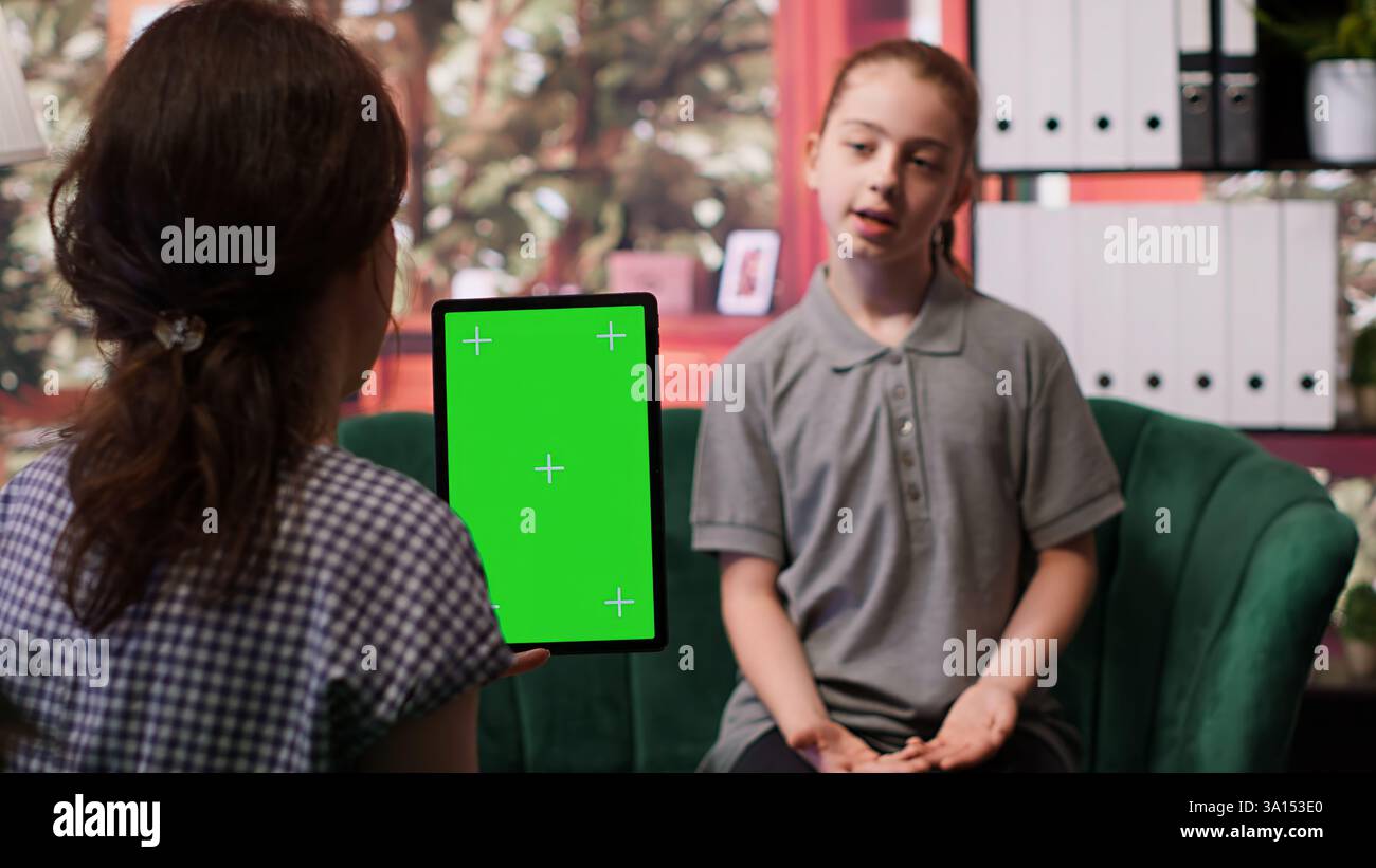 Teenager undergoing therapy for depression next to isolated chroma key ...