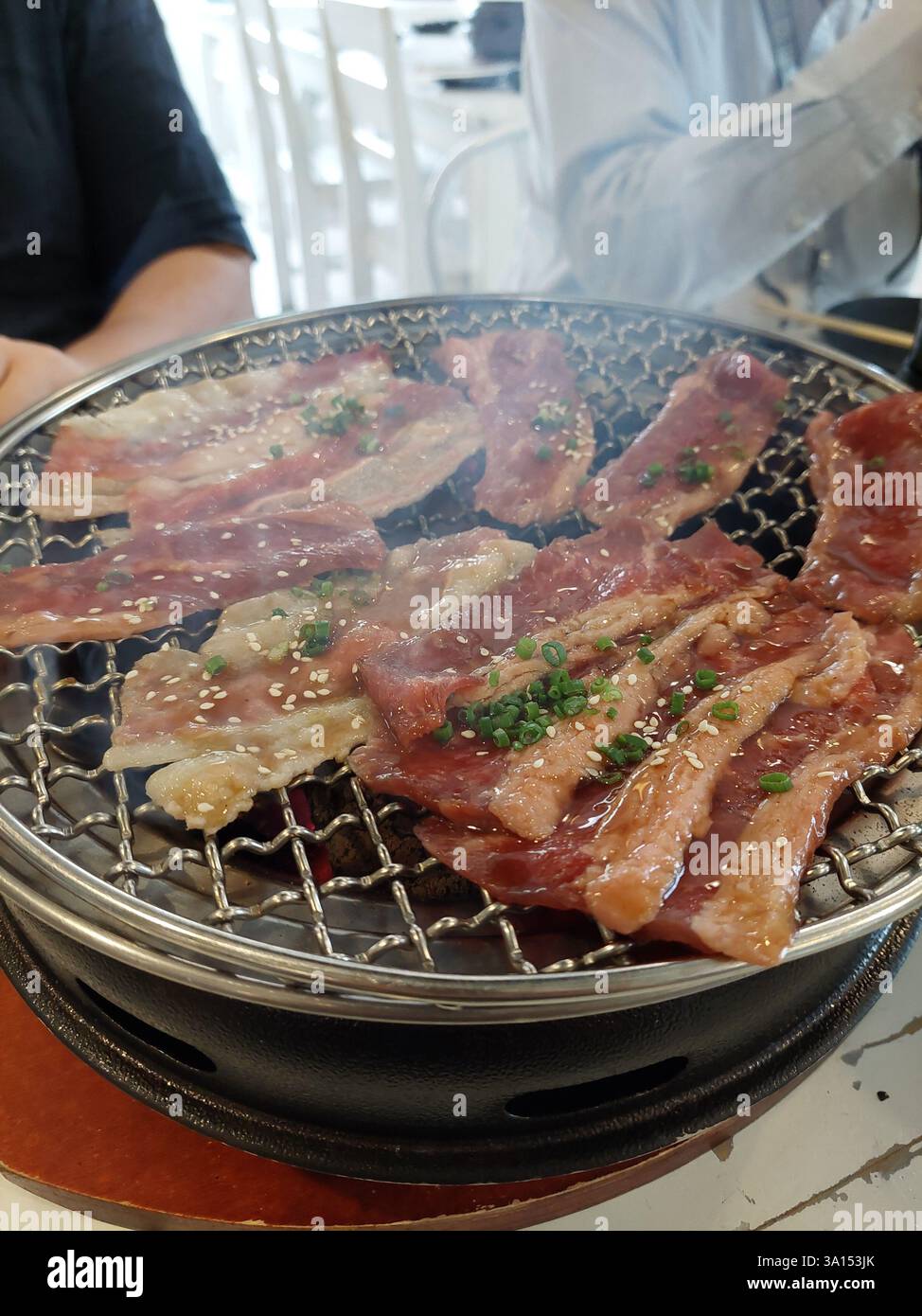 Grilled raw meat beef and pork (barbeque, bbq) a food cooking on wagyu ...