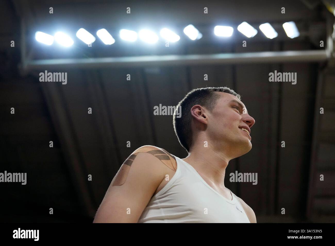 Iowa forward Payton Sandfort stands on the court before an NCAA college ...