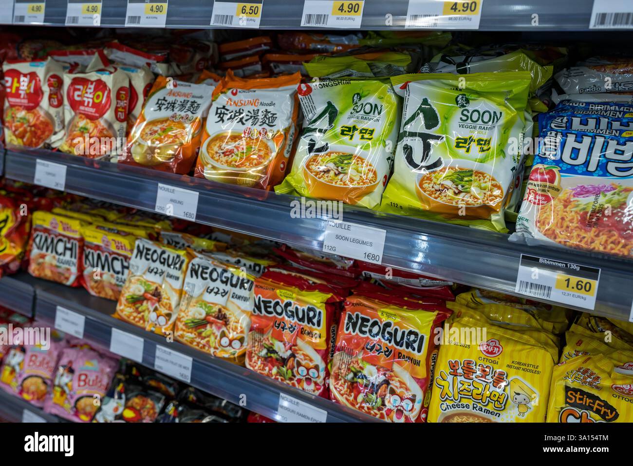Discovering flavorful ramen varieties in a vibrant Asian market aisle ...