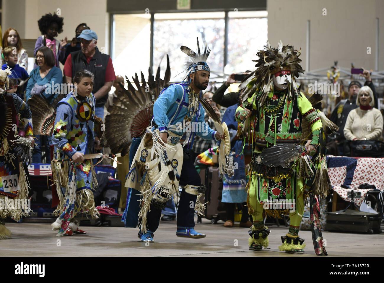 Native American men dancing in fathers and native dress Stock Photo - Alamy