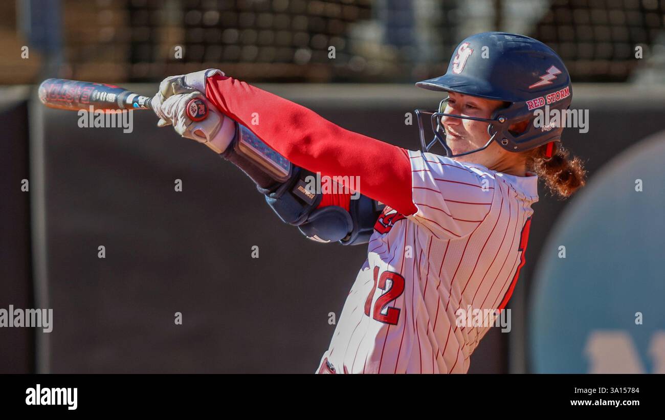 St John's pitcher Ana Serafinko (12) bats during an NCAA softball game ...