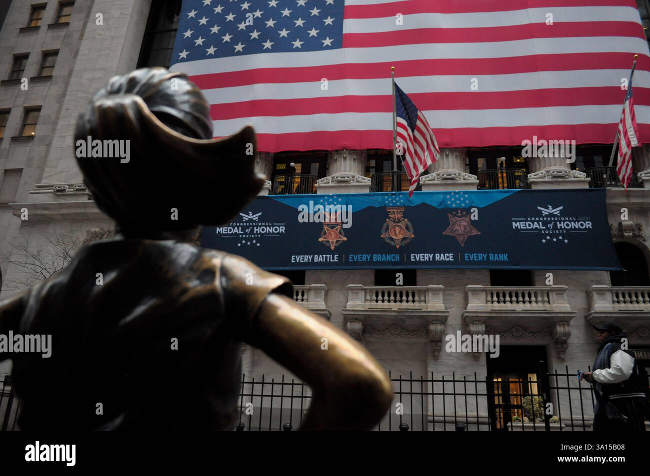 The "Fearless Girl" statue is seen in front of the New York Stock ...