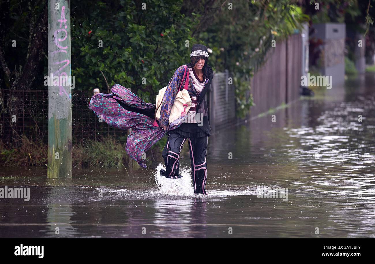 Byron Bay Lismore, Australia. 06th Mar, 2025. A person walks on a ...