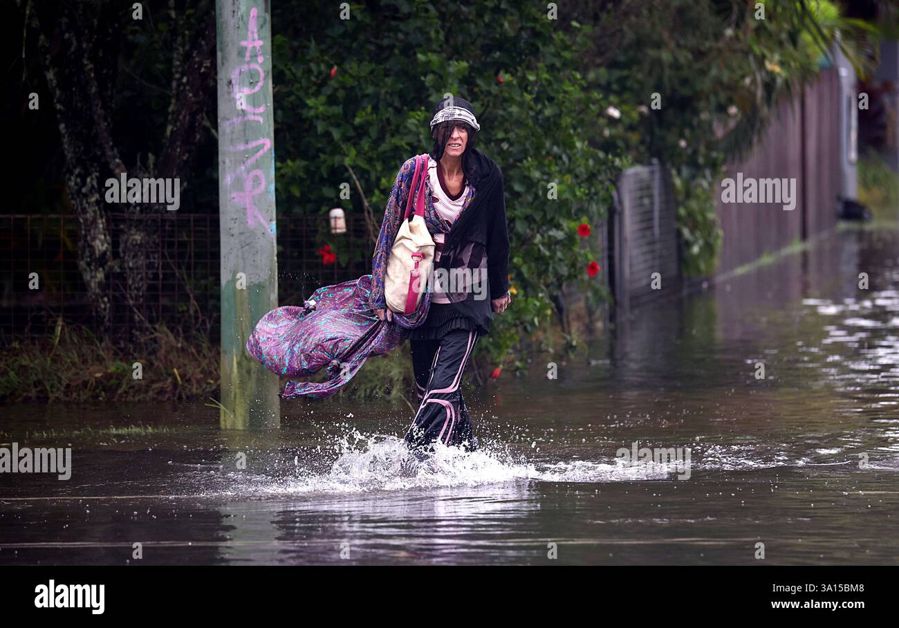 Byron Bay Lismore, Australia. 06th Mar, 2025. A person walks on a ...