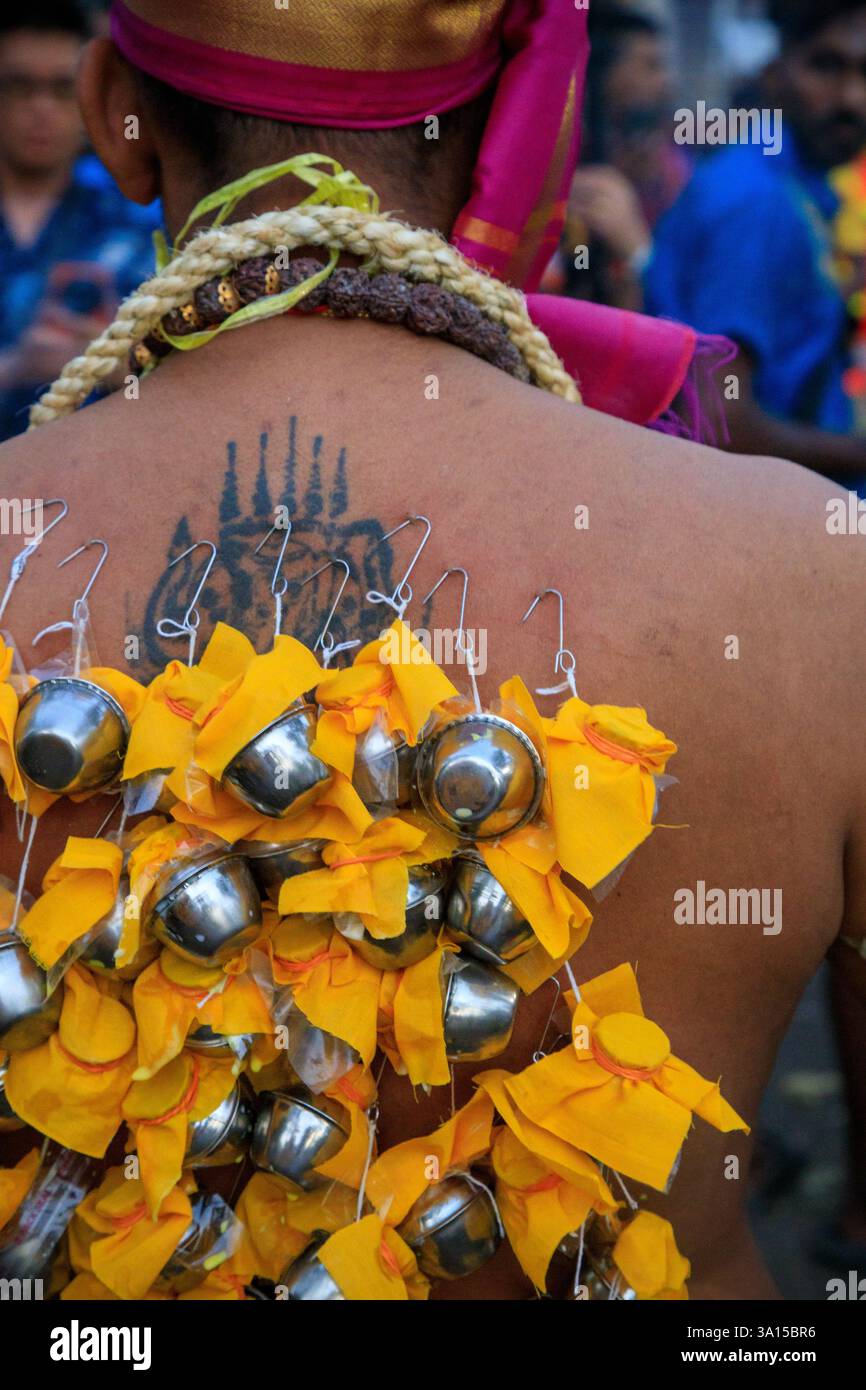 Penang, Malaysia - February 9, 2025: A devotee with piercings for ...