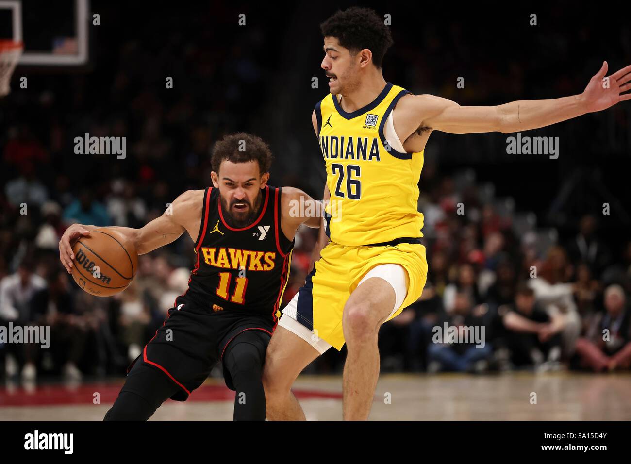 Atlanta Hawks guard Trae Young (11) drives past Indiana Pacers guard ...