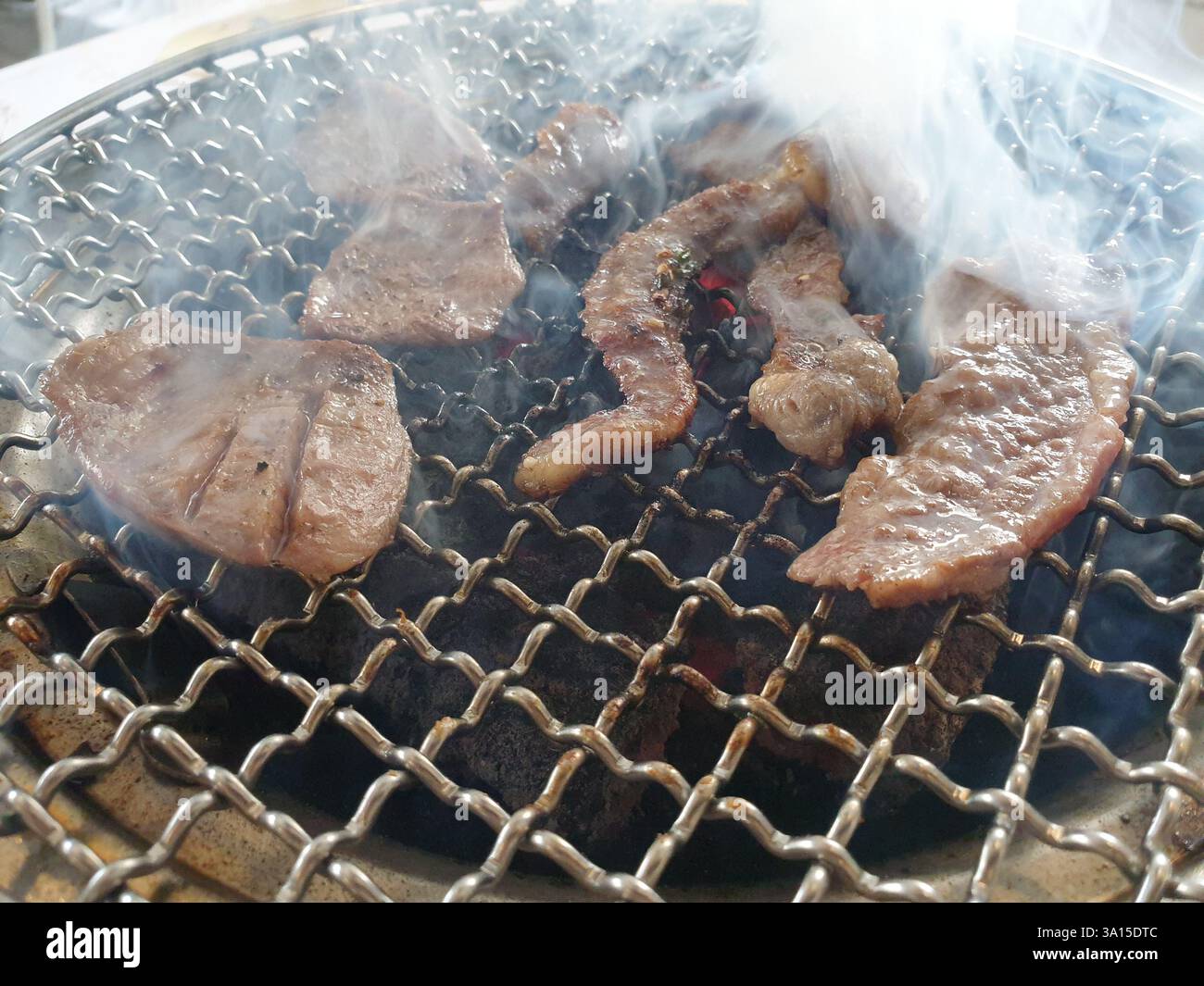 Grilled raw meat beef and pork (barbeque, bbq) a food cooking on wagyu ...