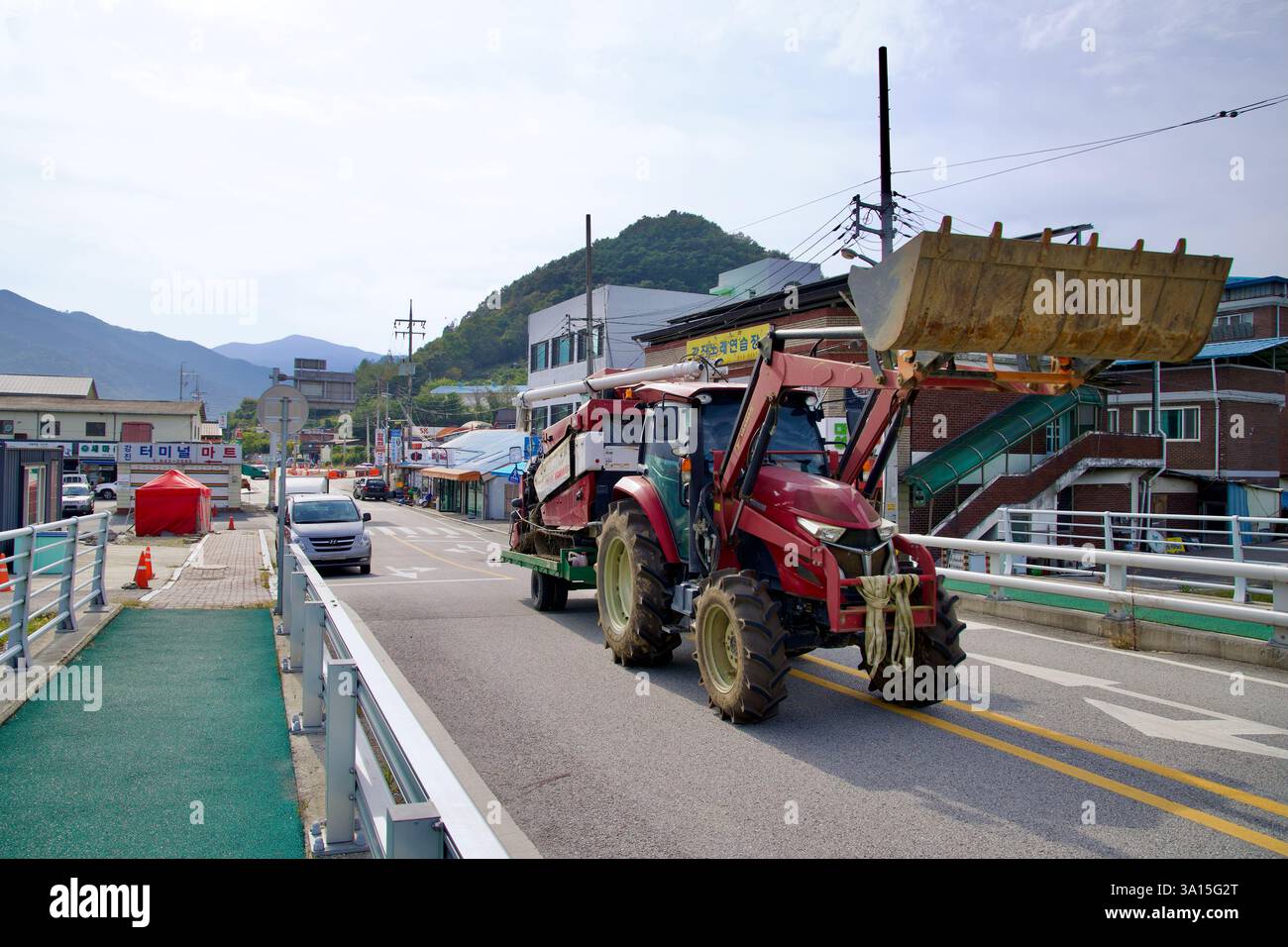 Gangjin, South Korea - October 4, 2021: A tractor with a front loader ...