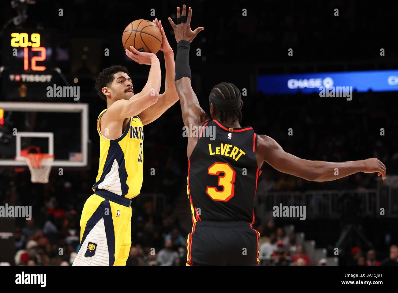 Indiana Pacers guard Ben Sheppard, left, shoots the ball against ...