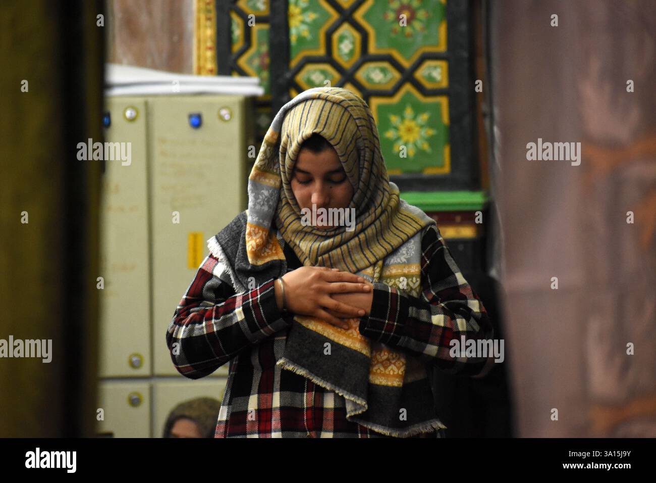 A Kashmiri Muslim praying inside the Dastgeer Sahib Shrine in Srinagar ...